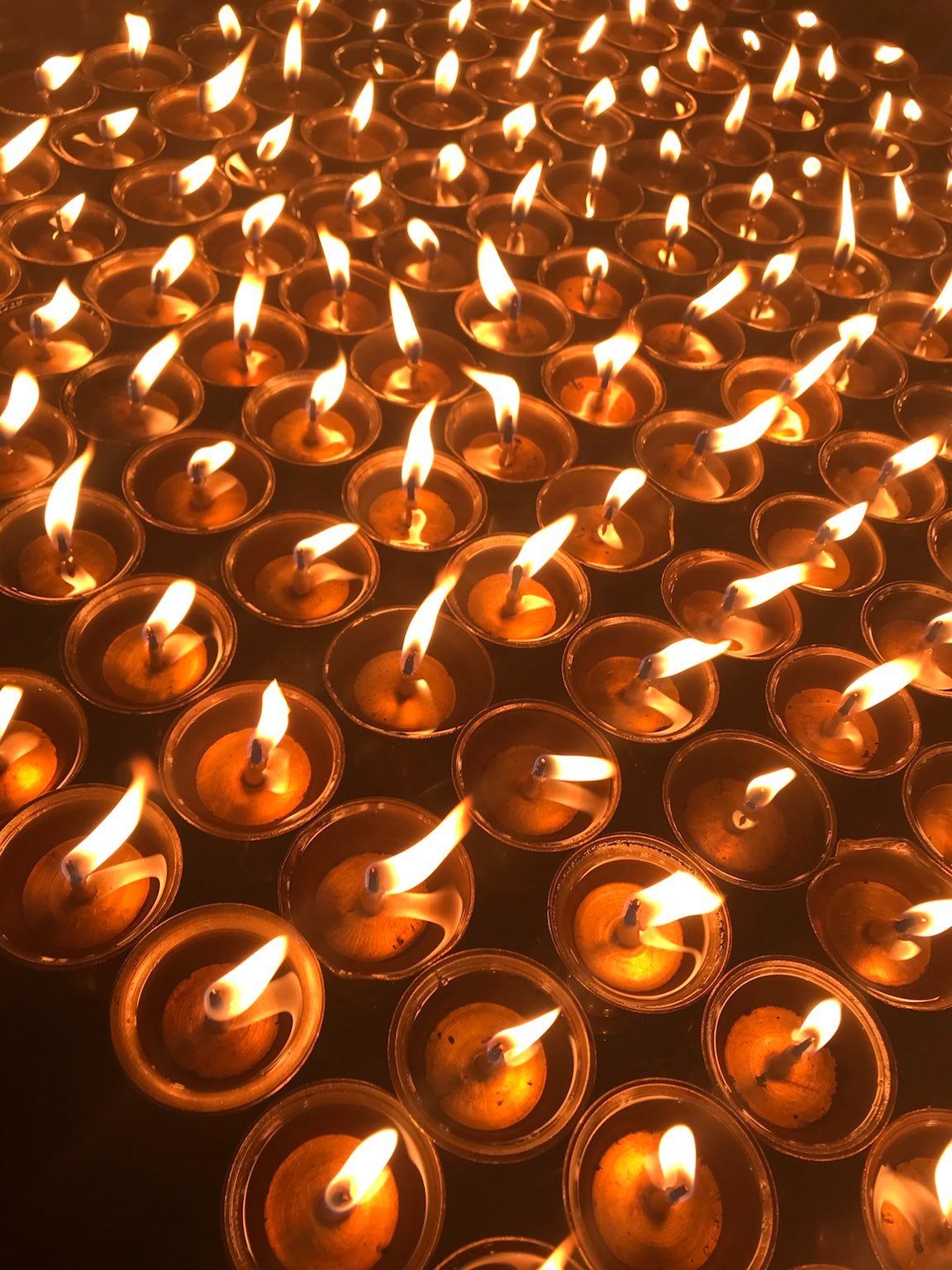 Light offerings at Boudha Stupa | Ah-Lama